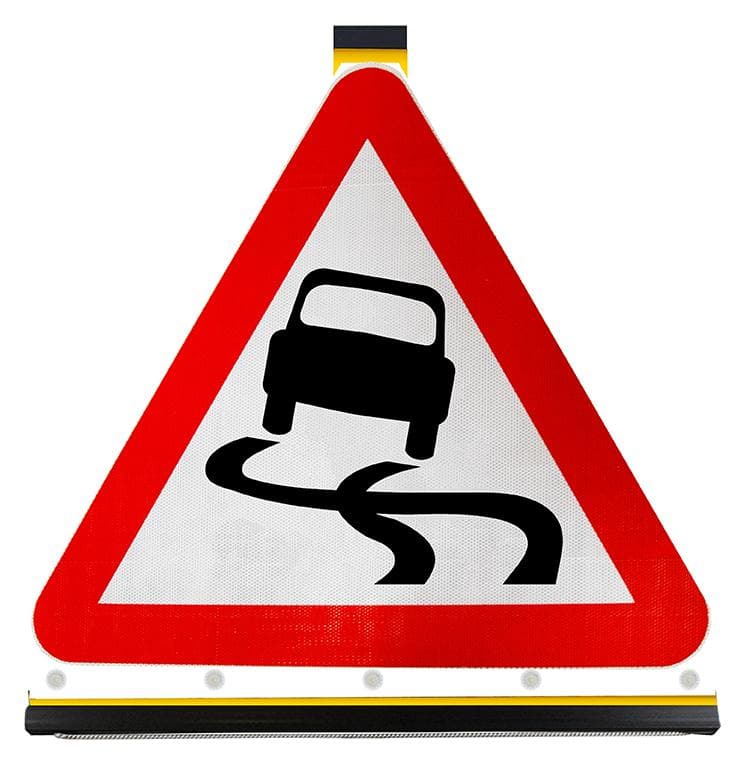 Slippery Road Surface Ahead — Protect Signs
